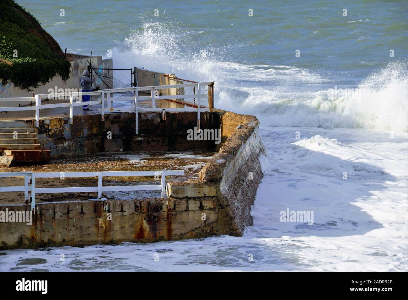 High Tide at Ocean Beach Pier Stock Photo - Alamy