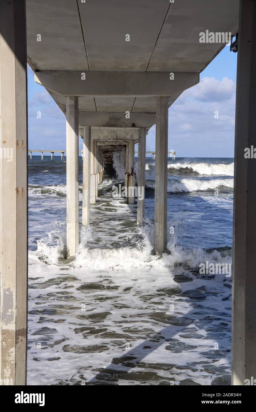 High Tide at Ocean Beach Pier Stock Photo - Alamy