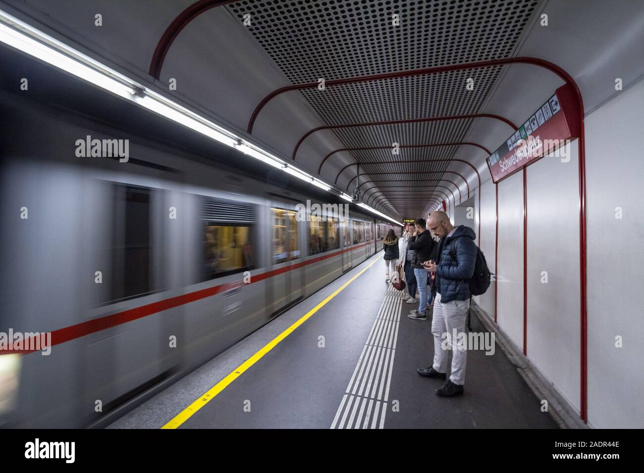 VIENNA, AUSTRIA - NOVEMBER 6, 2019: Man standing and watching his ...
