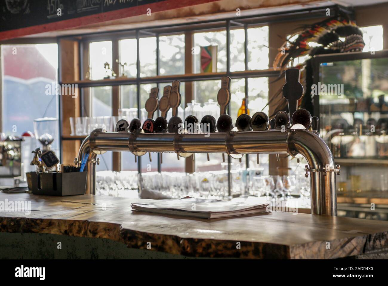empty bar with taps under beer Stock Photo - Alamy