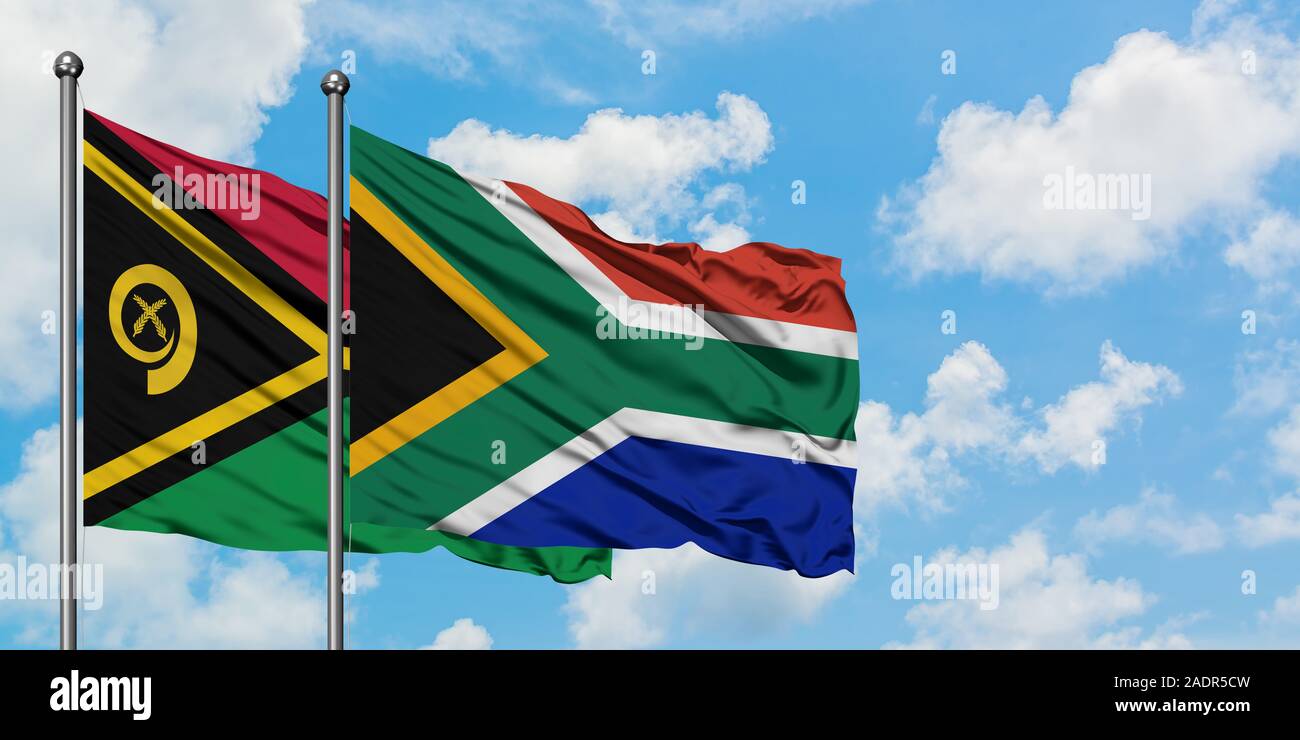 Vanuatu and South Africa flag waving in the wind against white cloudy ...