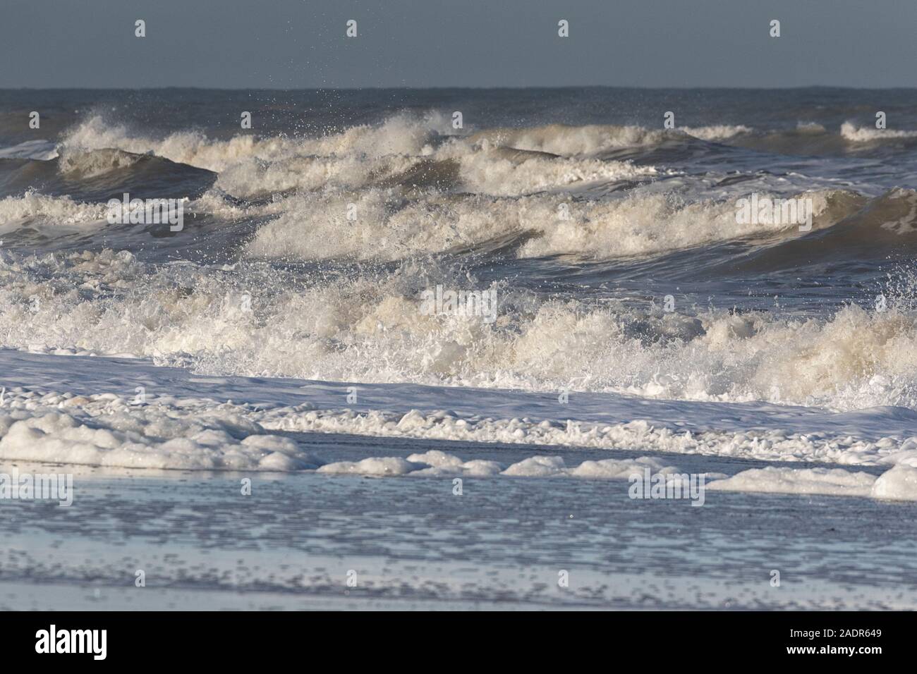 Sea sculpture, breaking waves & water Stock Photo - Alamy