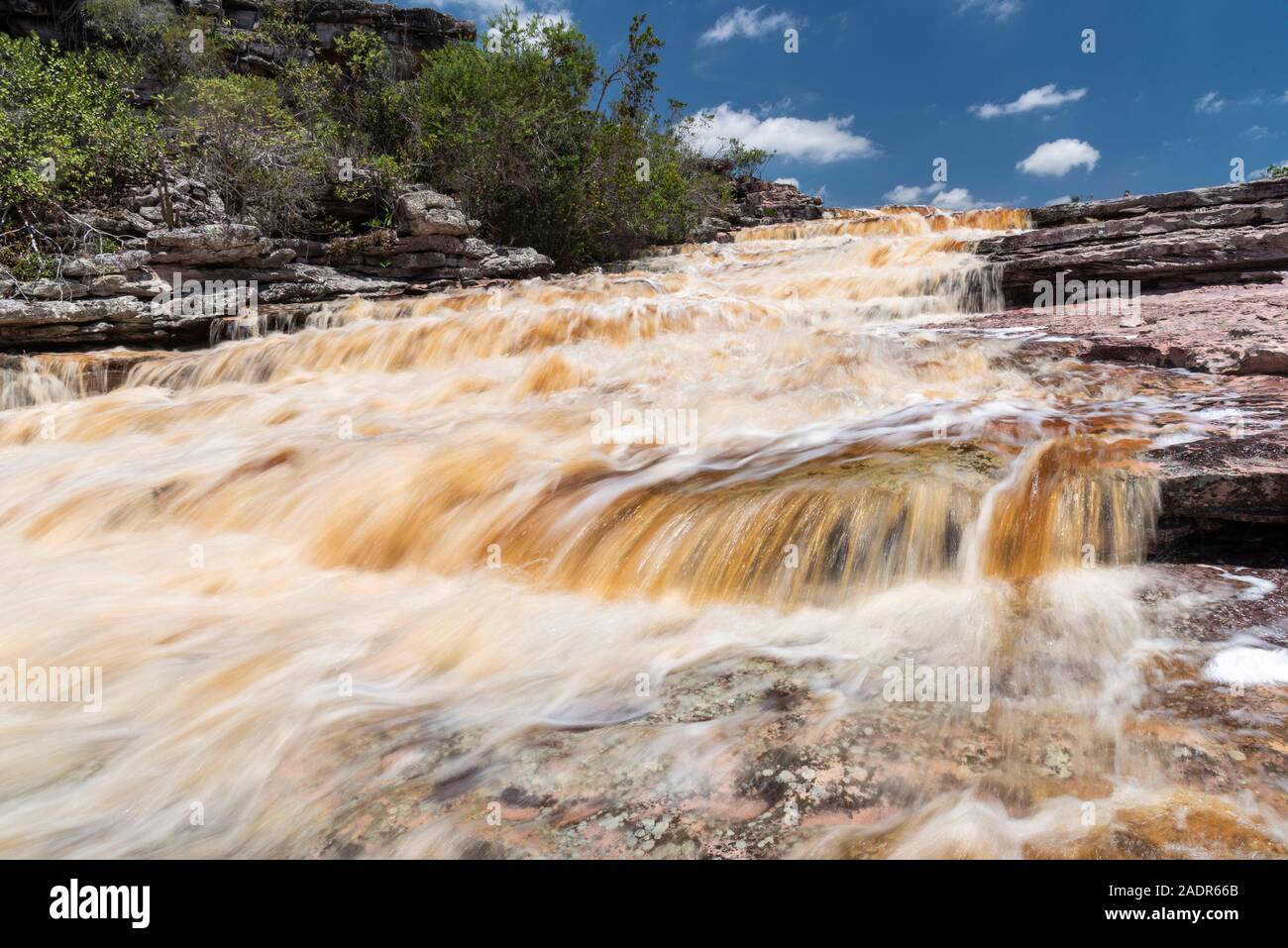 Beautiful natural waterfall on rocky landscape, Chapada Diamantina ...