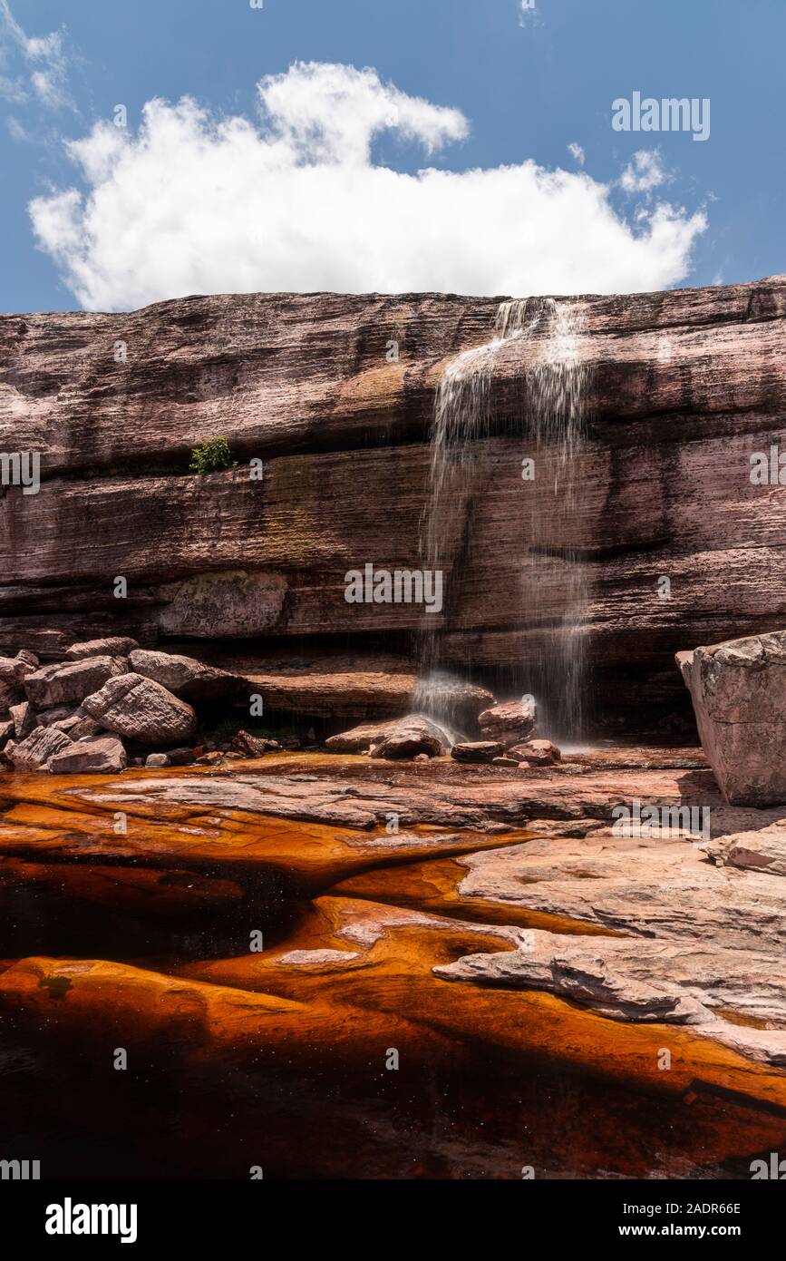 Beautiful natural waterfall on rocky landscape, Chapada Diamantina ...