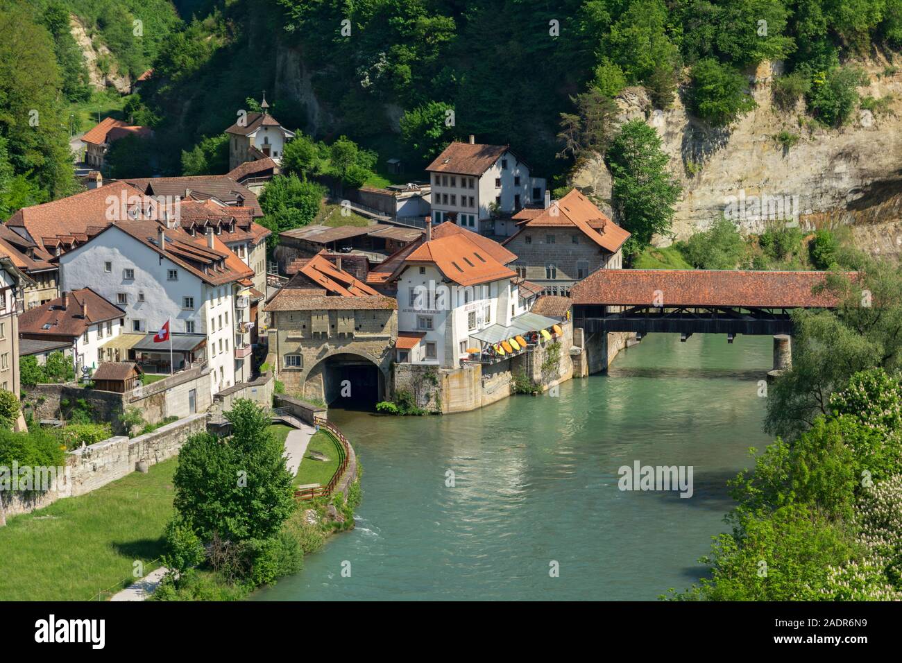 Switzerland, Fribourg, Sarine River, Pont de Berne covered bridge Stock ...