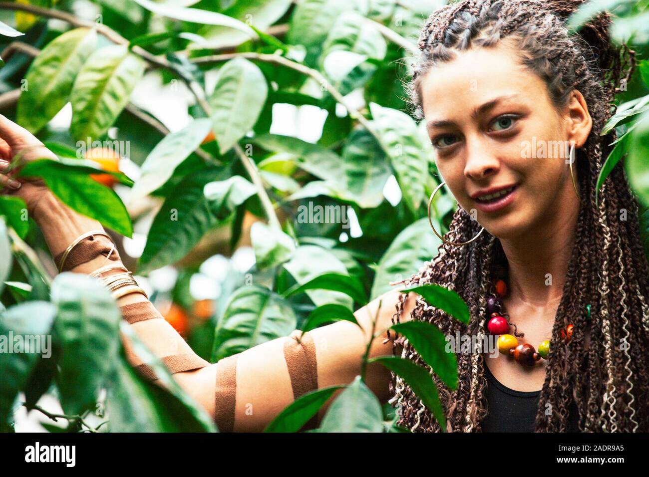 pretty islam woman in orange grove smiling, real muslim girl cheerful ...