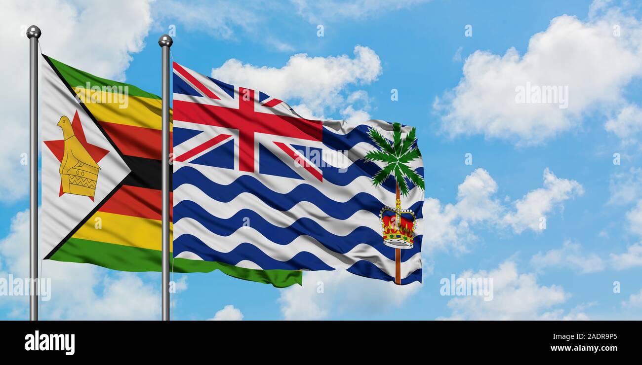 Zimbabwe and British Indian Ocean Territory flag waving in the wind ...