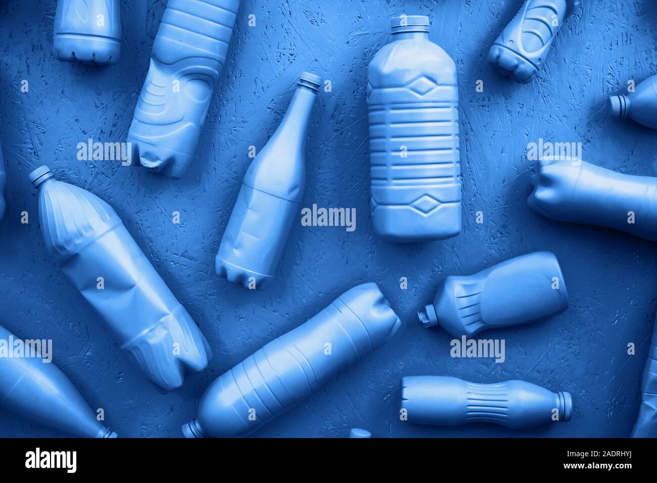 Plastic bottles in blue color. Eco concept. All bottles are in one ...