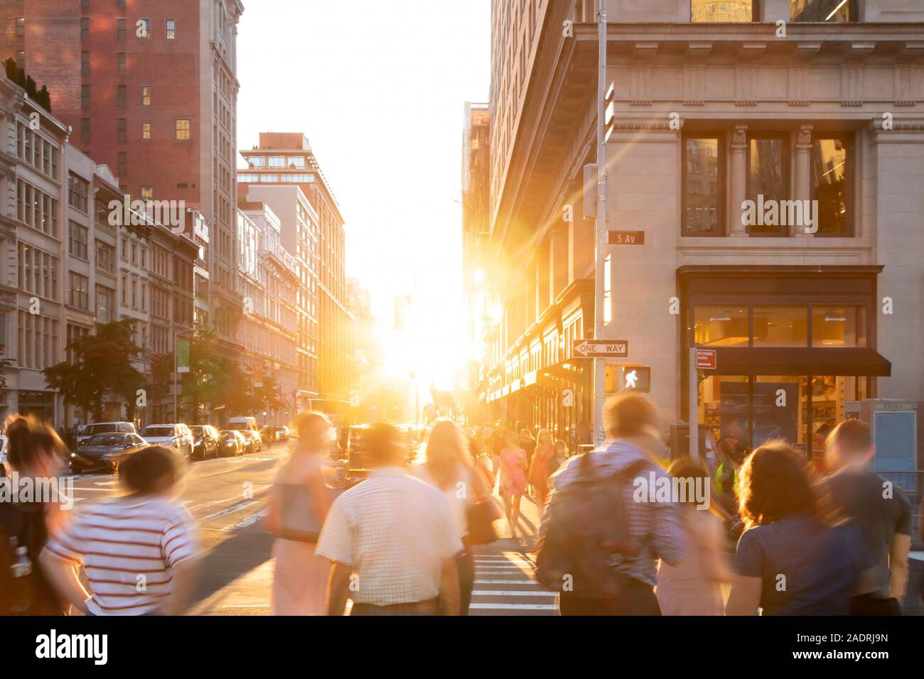 Busy crowds of people walking down the sidewalk on 23rd Street in New ...