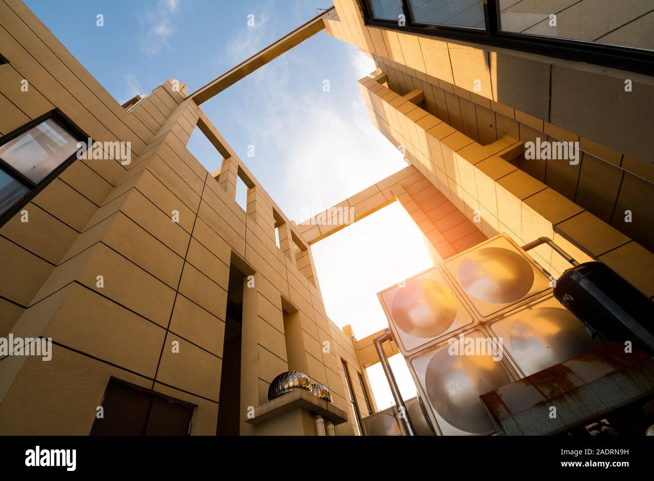 Bright outlook for business. Modern office block with sunny beautiful ...