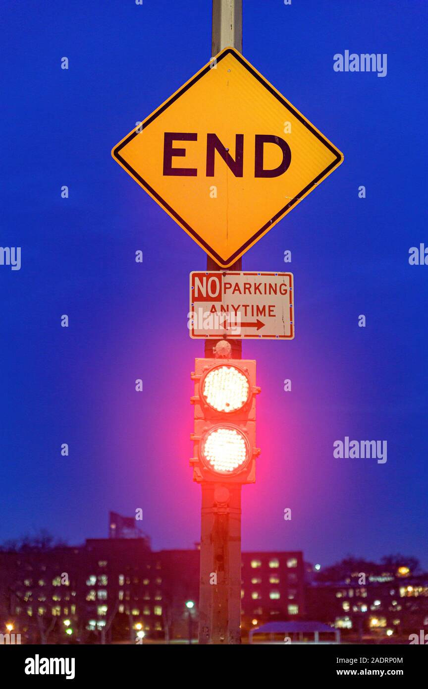 Street signs on a pole on Manhattan's Upper East Side, at night, New ...