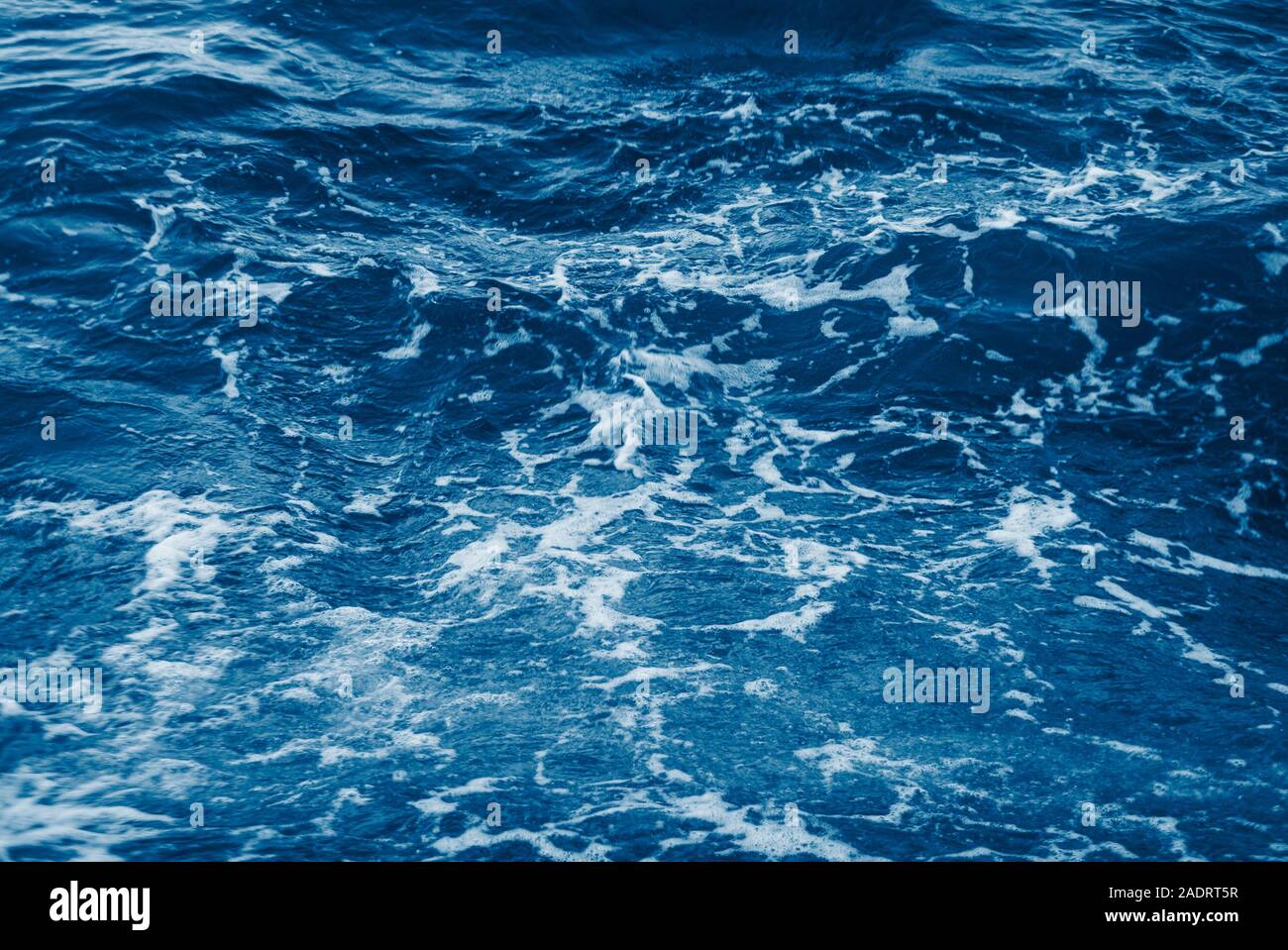 Abstract blue background of frothy sea surface. 2020 color trend Stock ...