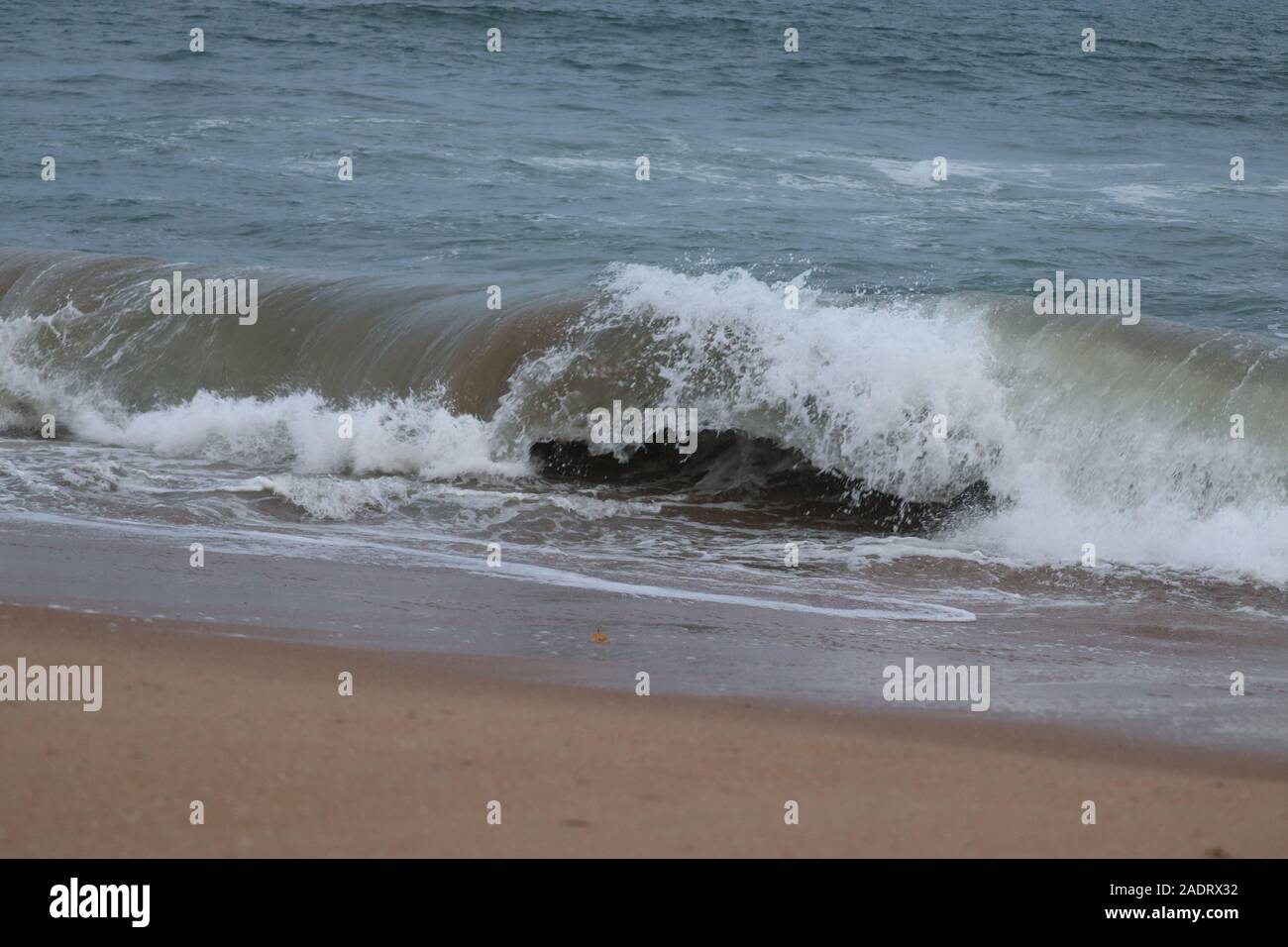 beautiful sandy beach and soft blue ocean wave.Bumpy tropical sandy ...