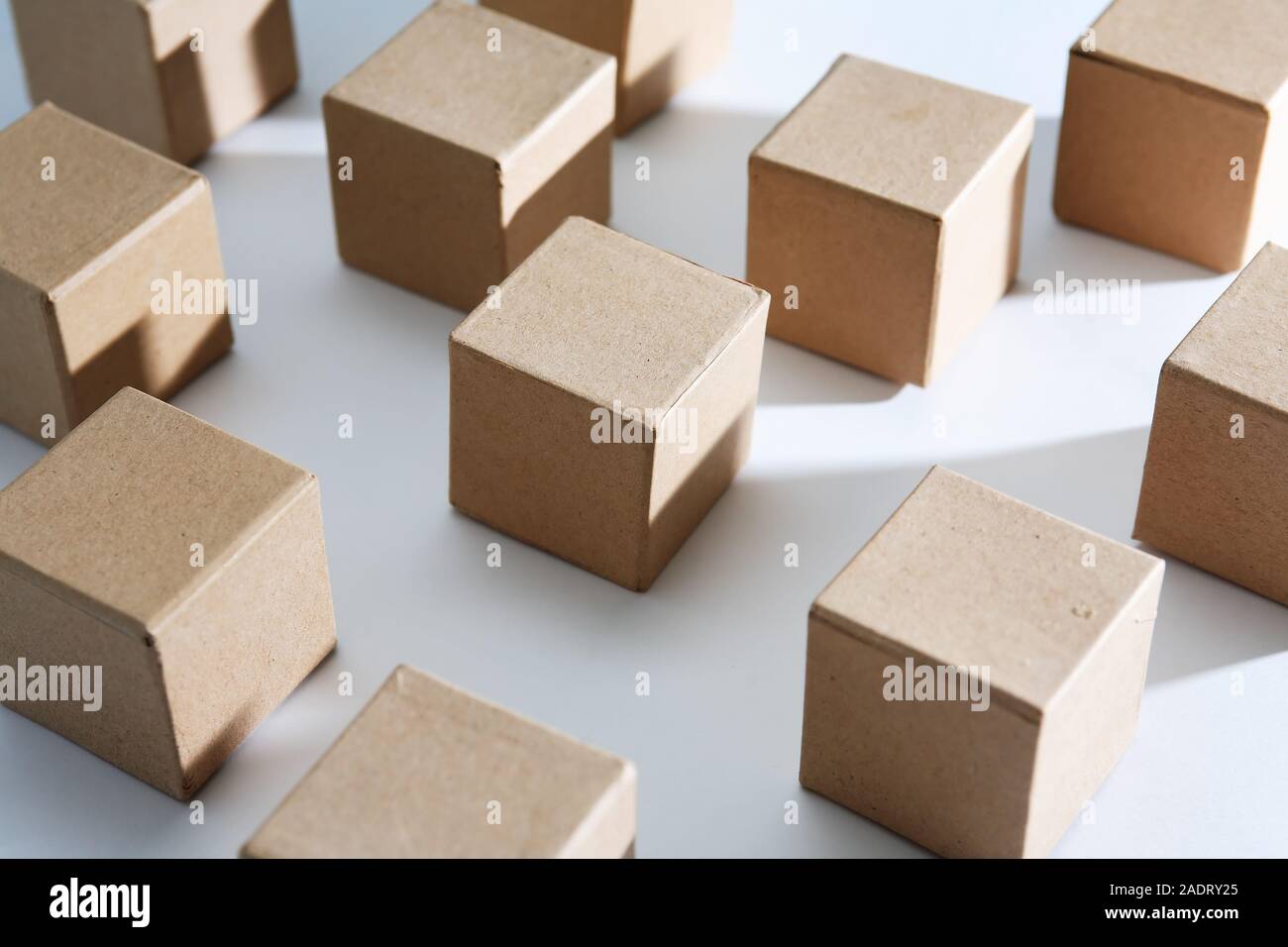 Set of cardboard cubes on white background with light and shadows Stock ...