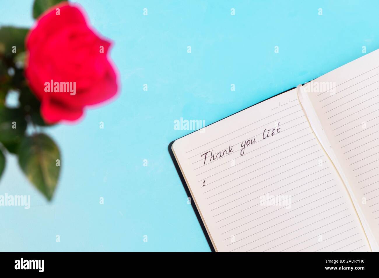 Top view of gratitude journal with handwritten words Thank you list ...