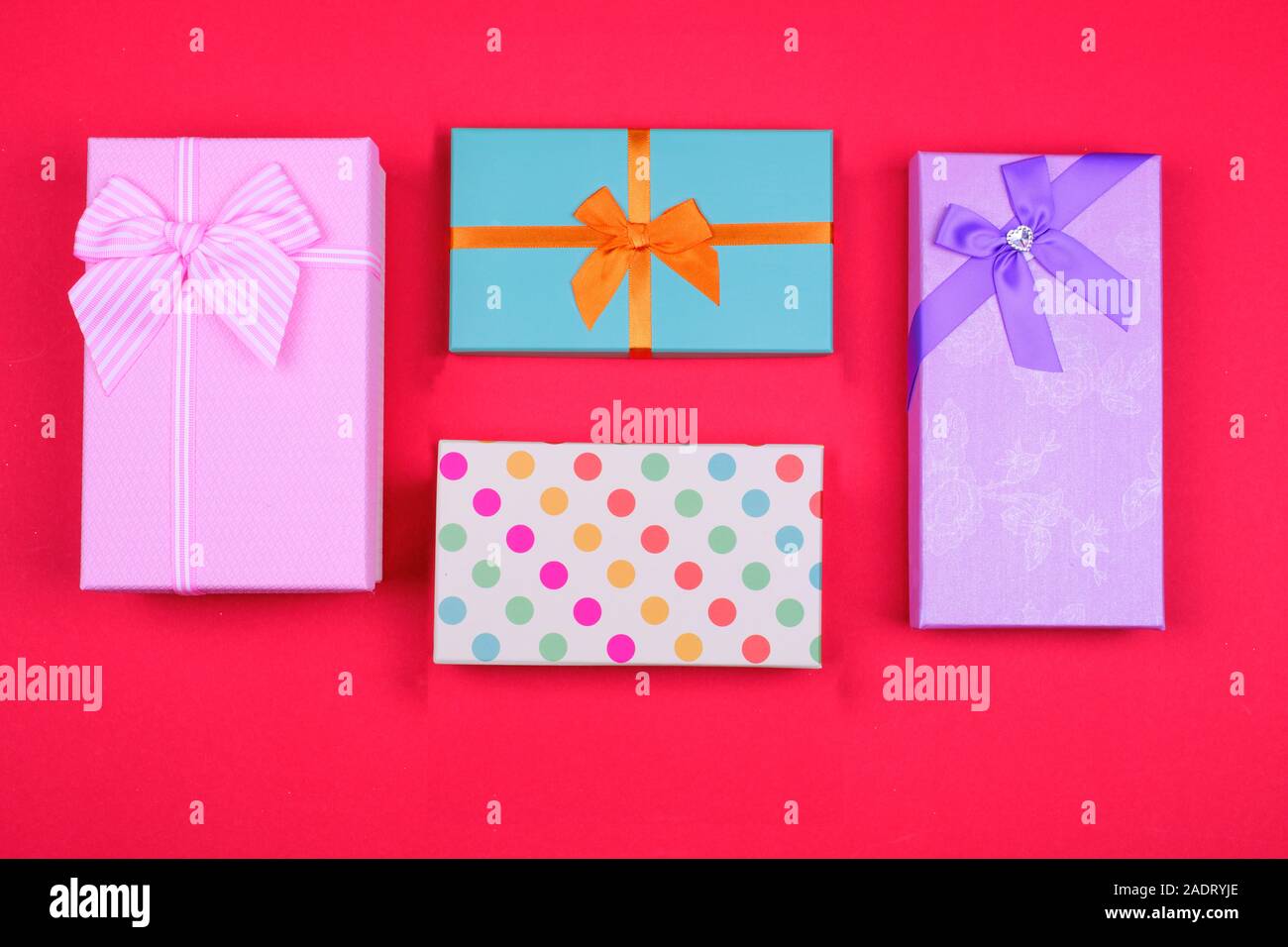 colorful rectangular gift boxes with bow Stock Photo - Alamy