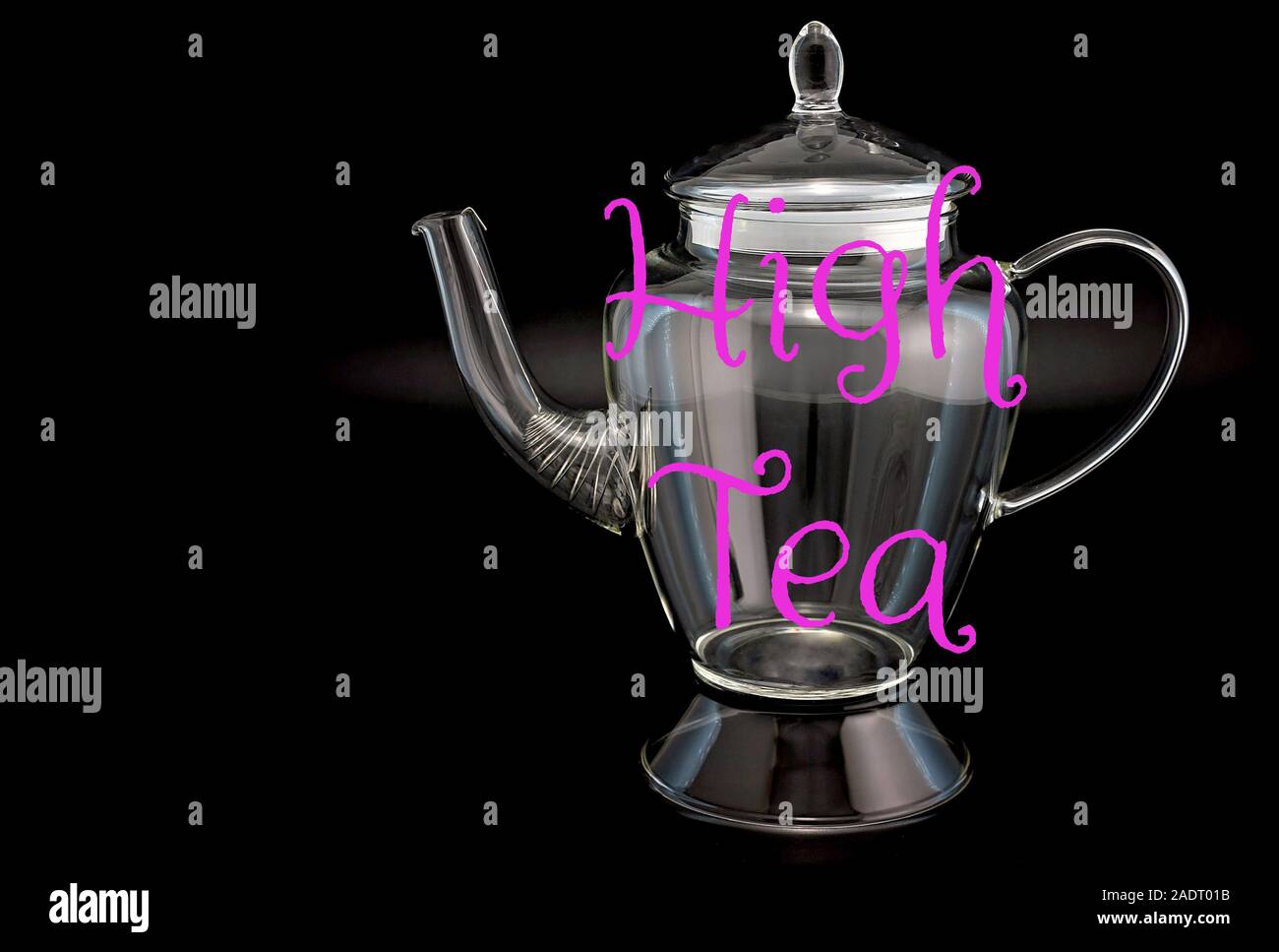 Empty transparent glass teapot isolated on a black background with High ...