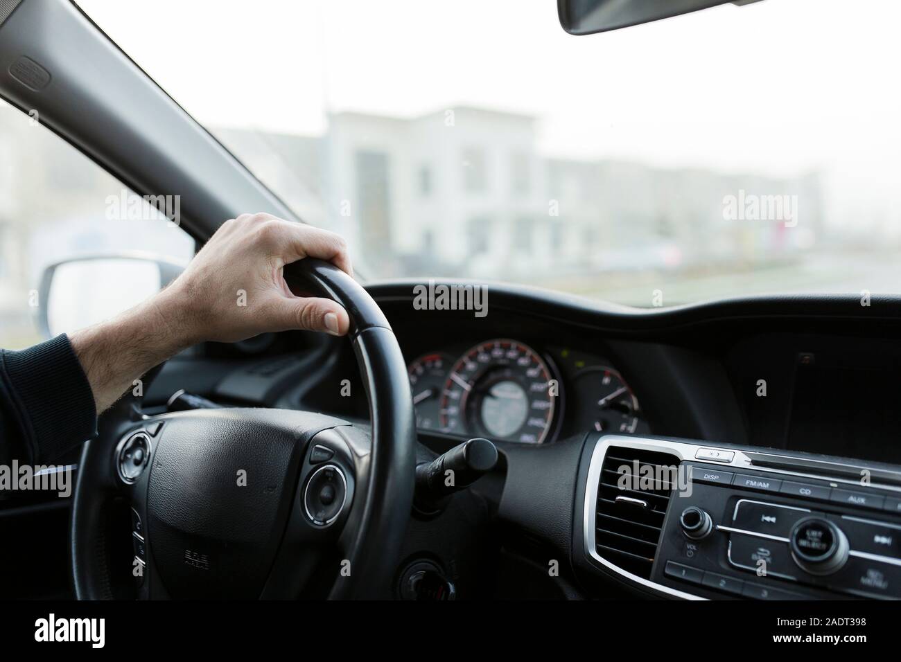Male hand on car steering wheel hi-res stock photography and images - Alamy