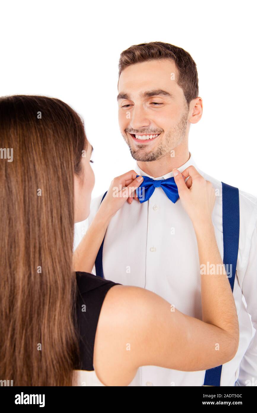 Closeup photo of a girl binding a blue bow to her boyfriend Stock Photo ...