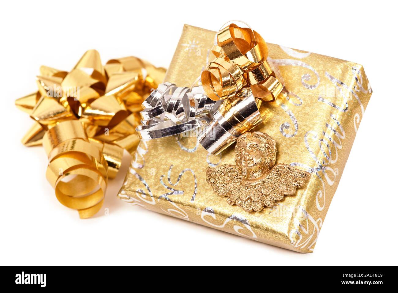 Small gift golden packed, isolated Stock Photo - Alamy