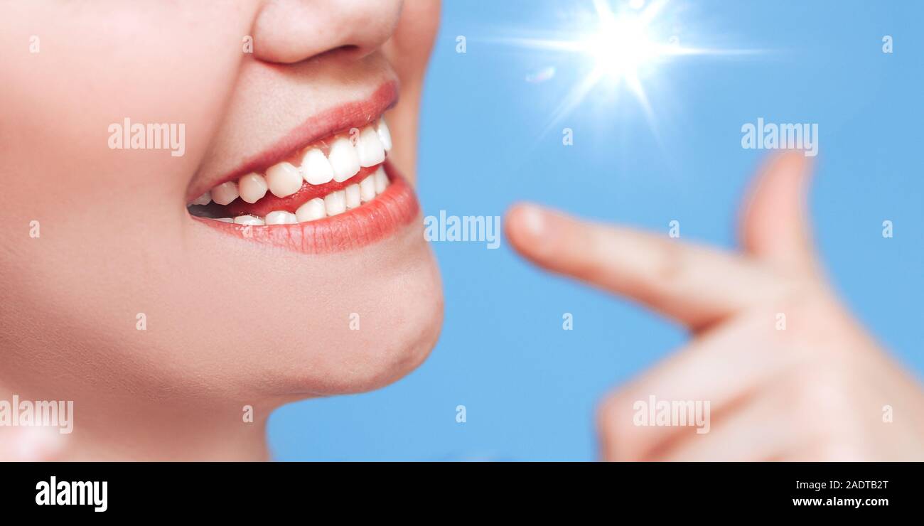Beautiful perfect smile of young woman Stock Photo - Alamy