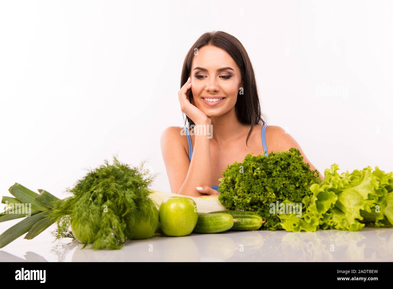 Happy slim woman showing vegetarian healthy lifestyle Stock Photo - Alamy