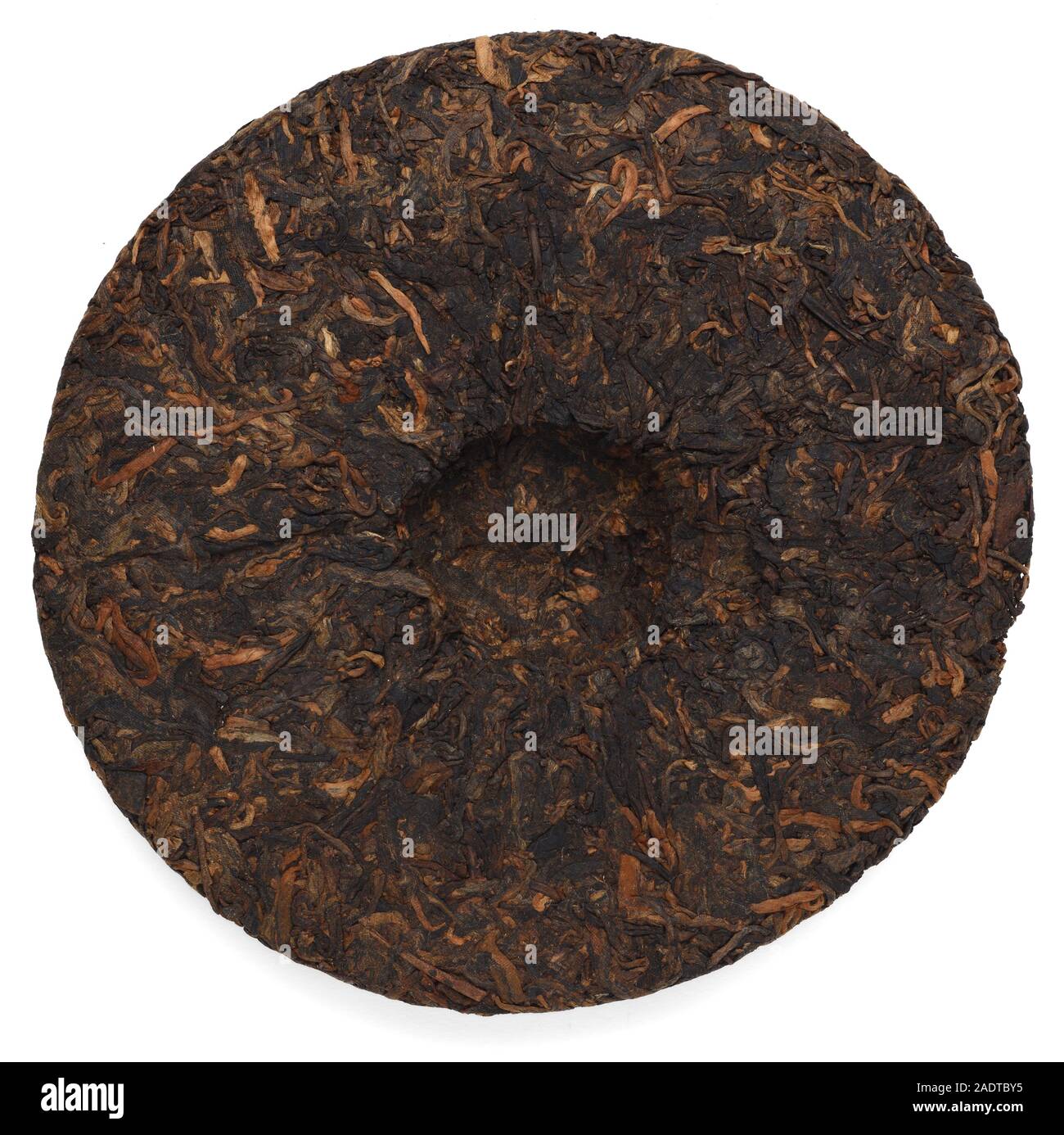 Ripe black puerh tea round shape isolated on white overhead view Stock ...