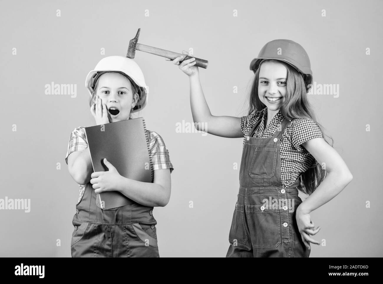 Children sisters renovation their room. Control renovation process ...