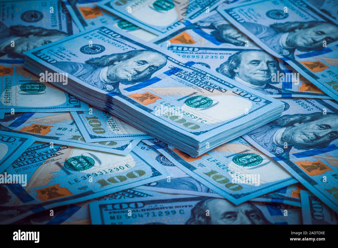 A pack of American dollars on the background of hundred dollar bills ...