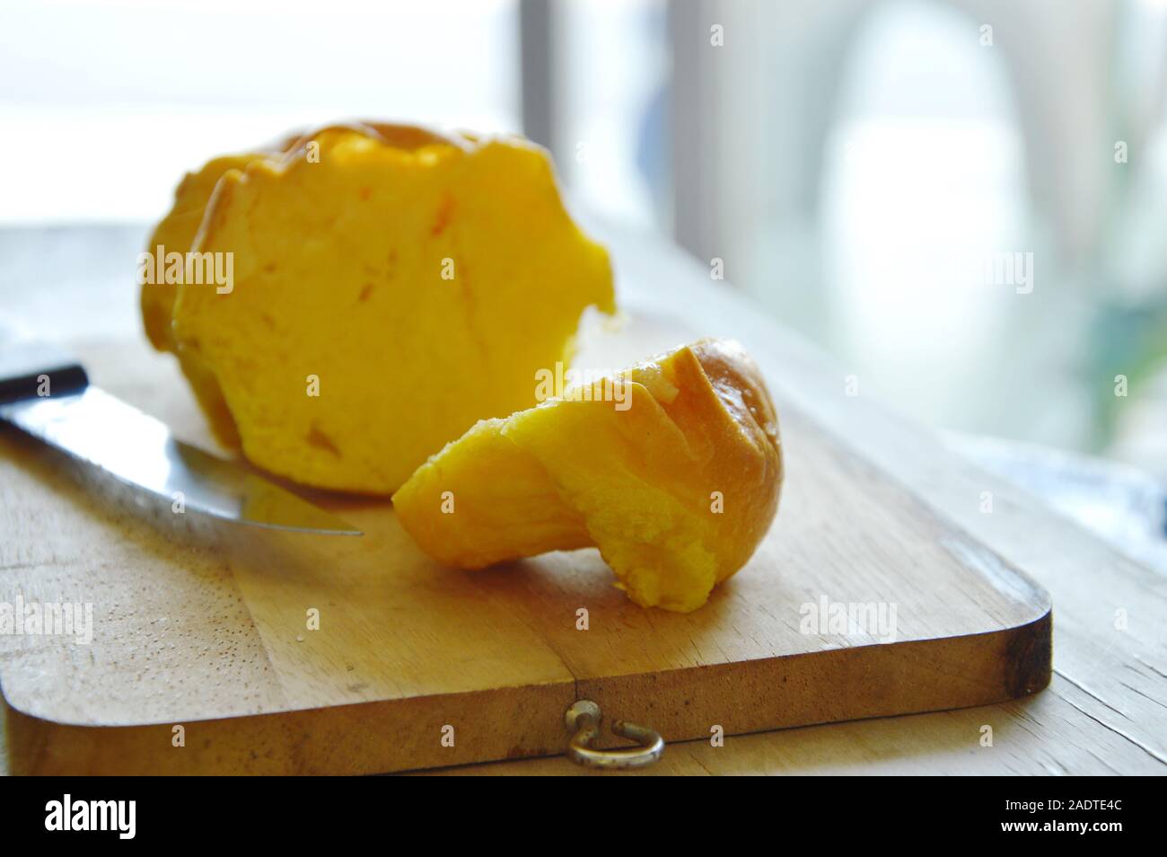 bread dressing butter and sugar cut on wooden chop block Stock Photo ...