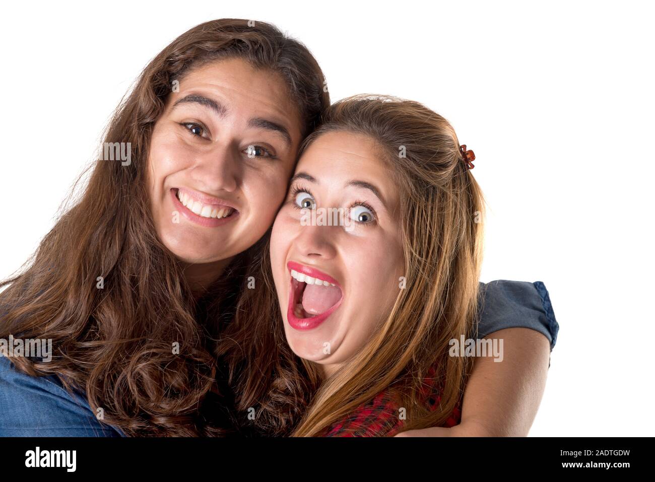 Two happy friends together isolated in white Stock Photo - Alamy