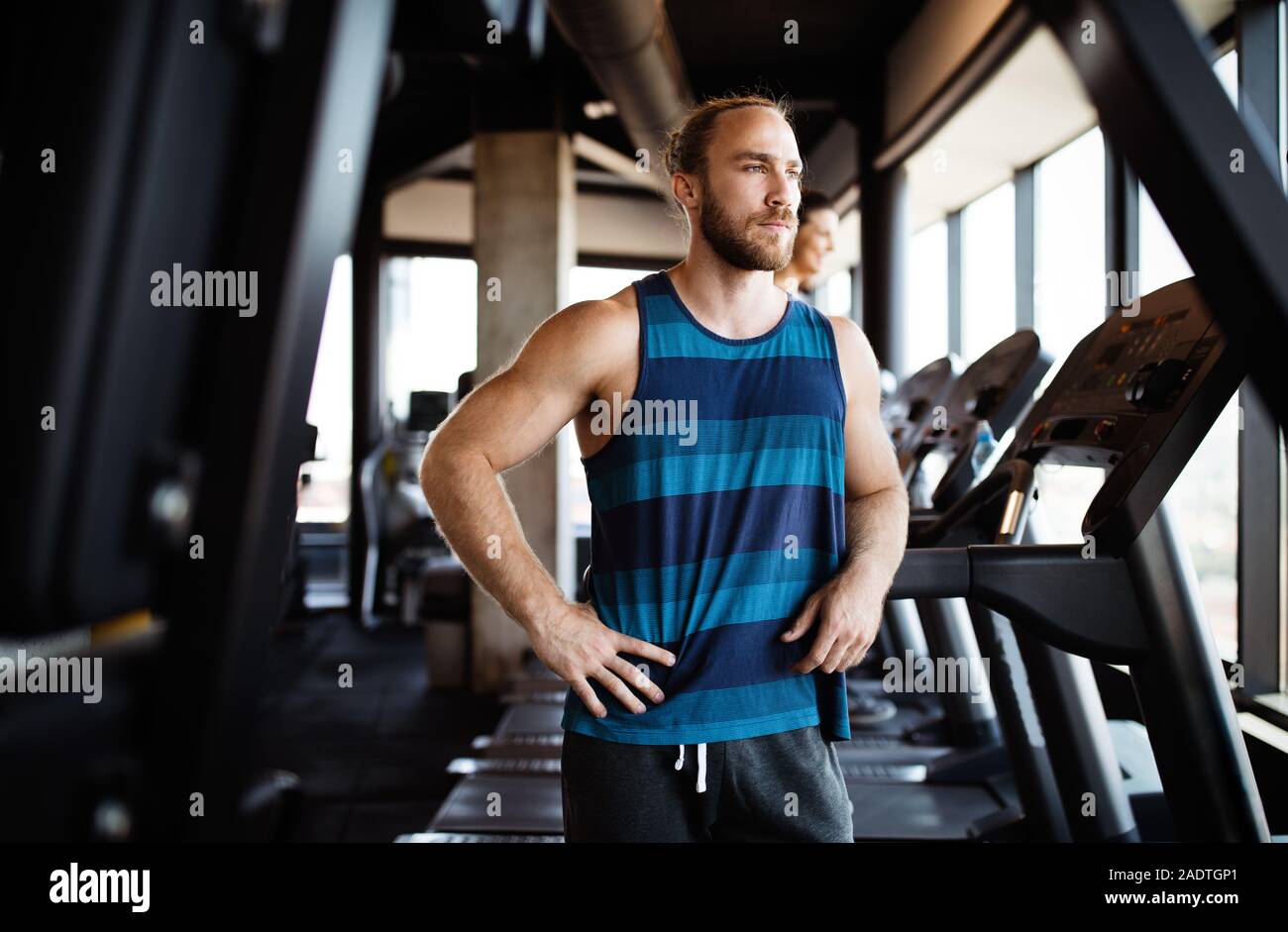 Group of young people running on treadmills in modern sport gym Stock ...