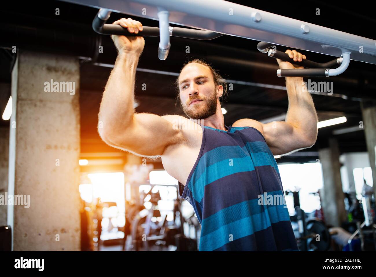 Fitness, sport, exercising and lifestyle concep Young man working out ...