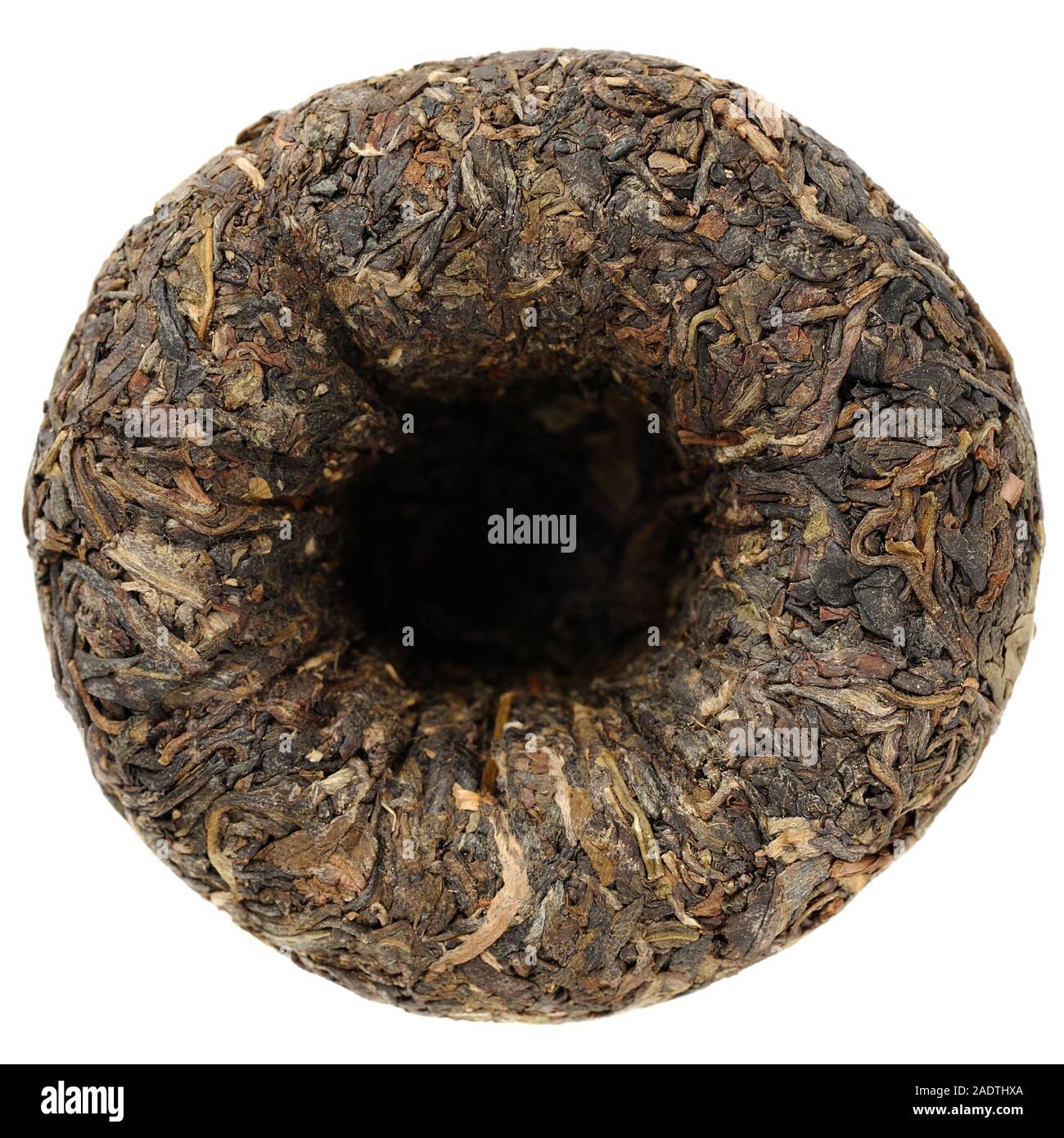 Raw puerh tea tuocha shape isolated Stock Photo - Alamy