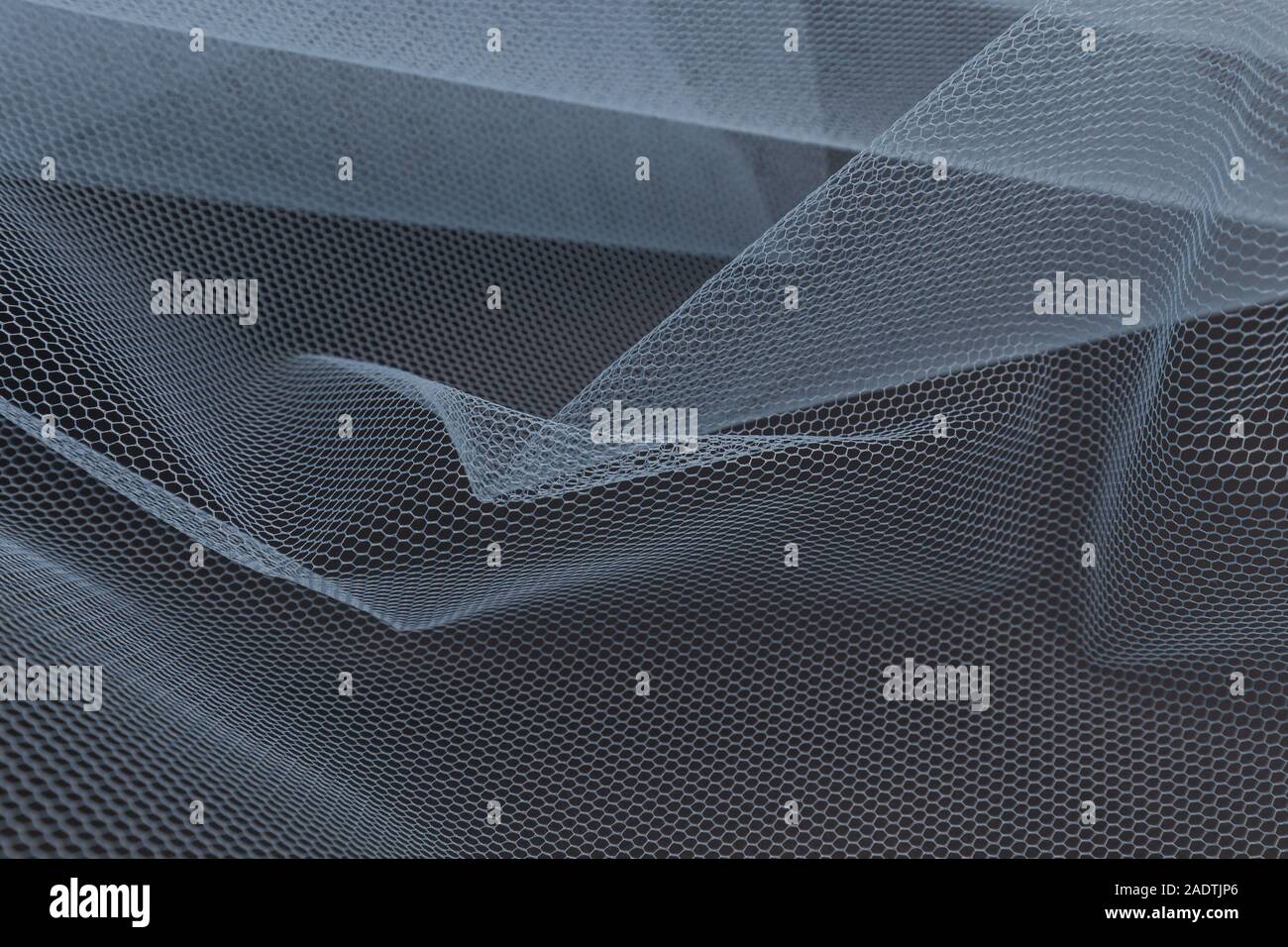 Beautiful close up of white tulle fabric with textile texture ...