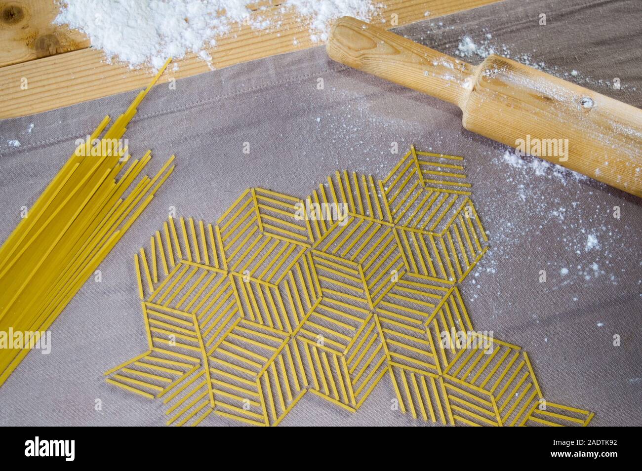 Spaghetti in geometric shapes. Food conception Stock Photo - Alamy