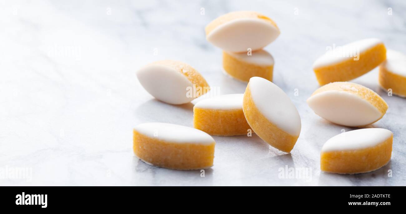 Calisson on marble table background. Traditional French Provence sweets ...