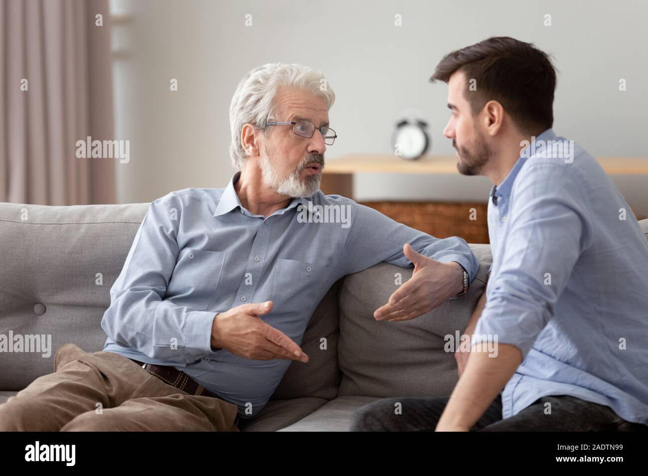 Father son talking serious hi-res stock photography and images - Alamy