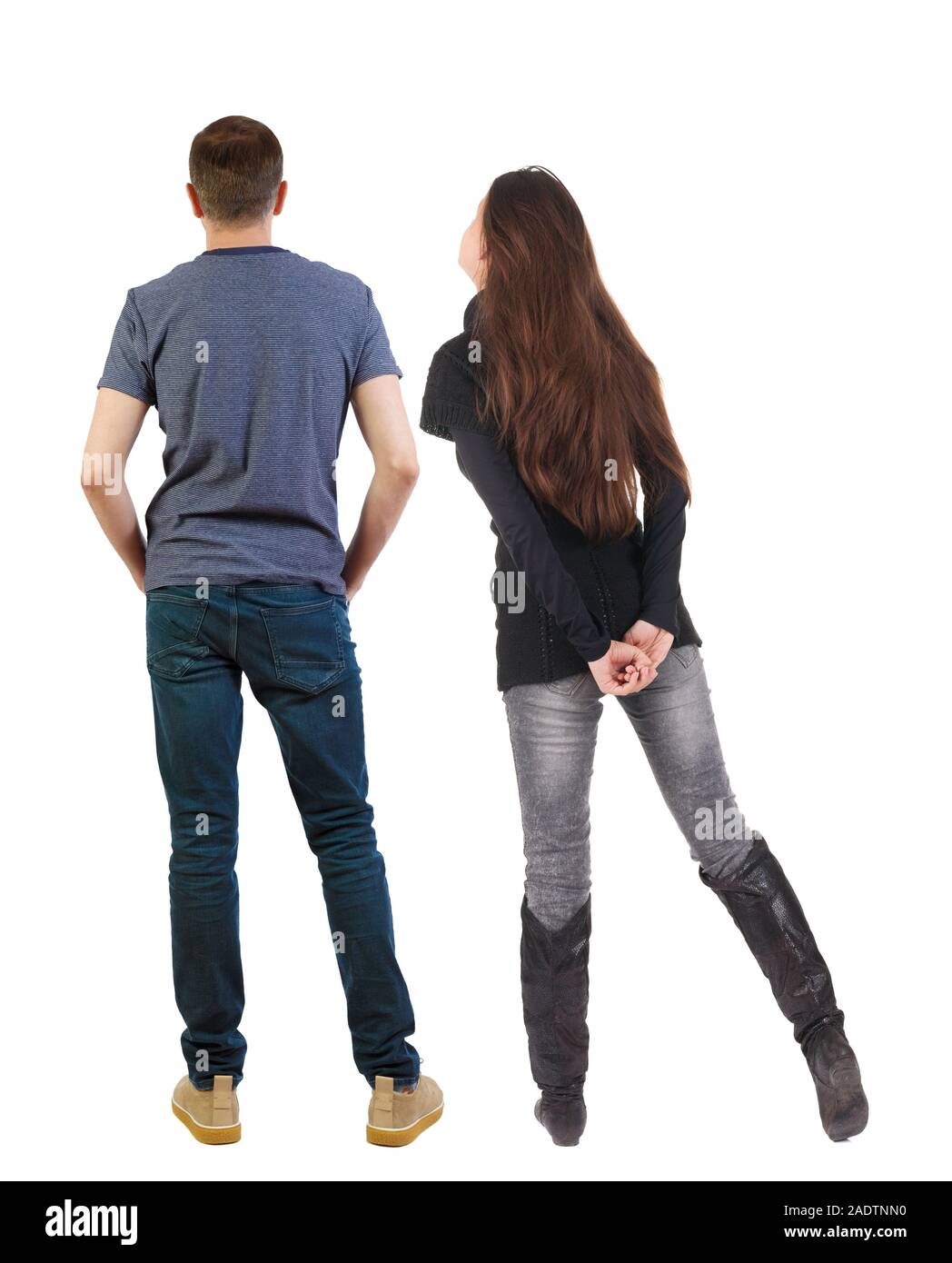 Back view of couple. beautiful friendly girl and guy together. Rear ...