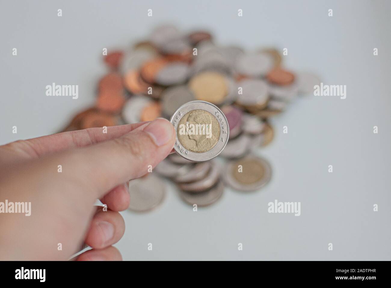 Thai baht coin on white Stock Photo - Alamy