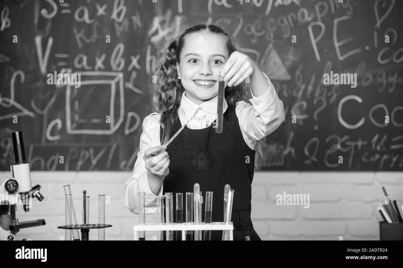 Happy child. Chemistry lesson. student doing biology experiments with ...