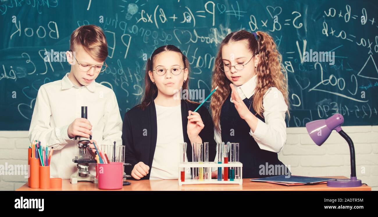 Happy children. Biology lesson. biology education. students doing ...