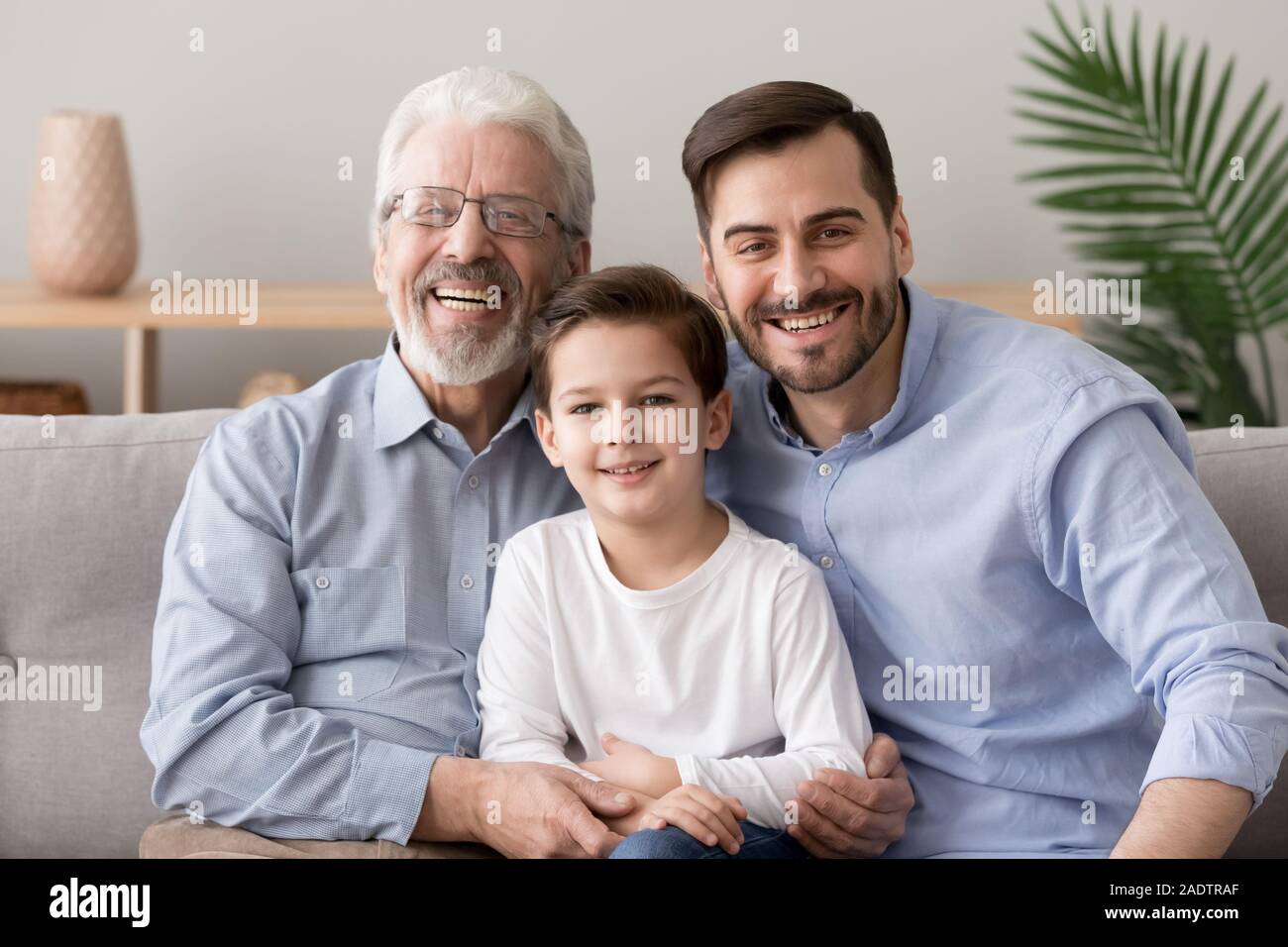 Grandfather son and grandson multi generational family portrait Stock ...