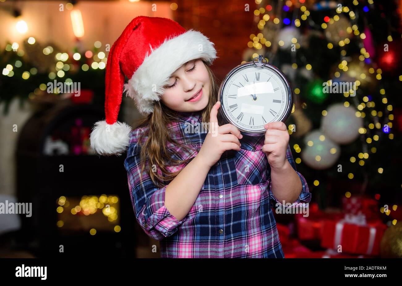 Are you ready. Time to celebrate. Happy new year. Elf child with clock ...