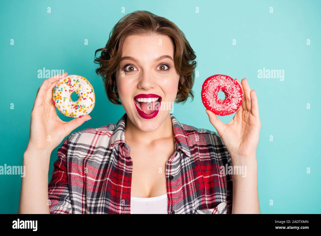 Close up photo of crazy funky girl hold two donuts unbelievable yummy ...