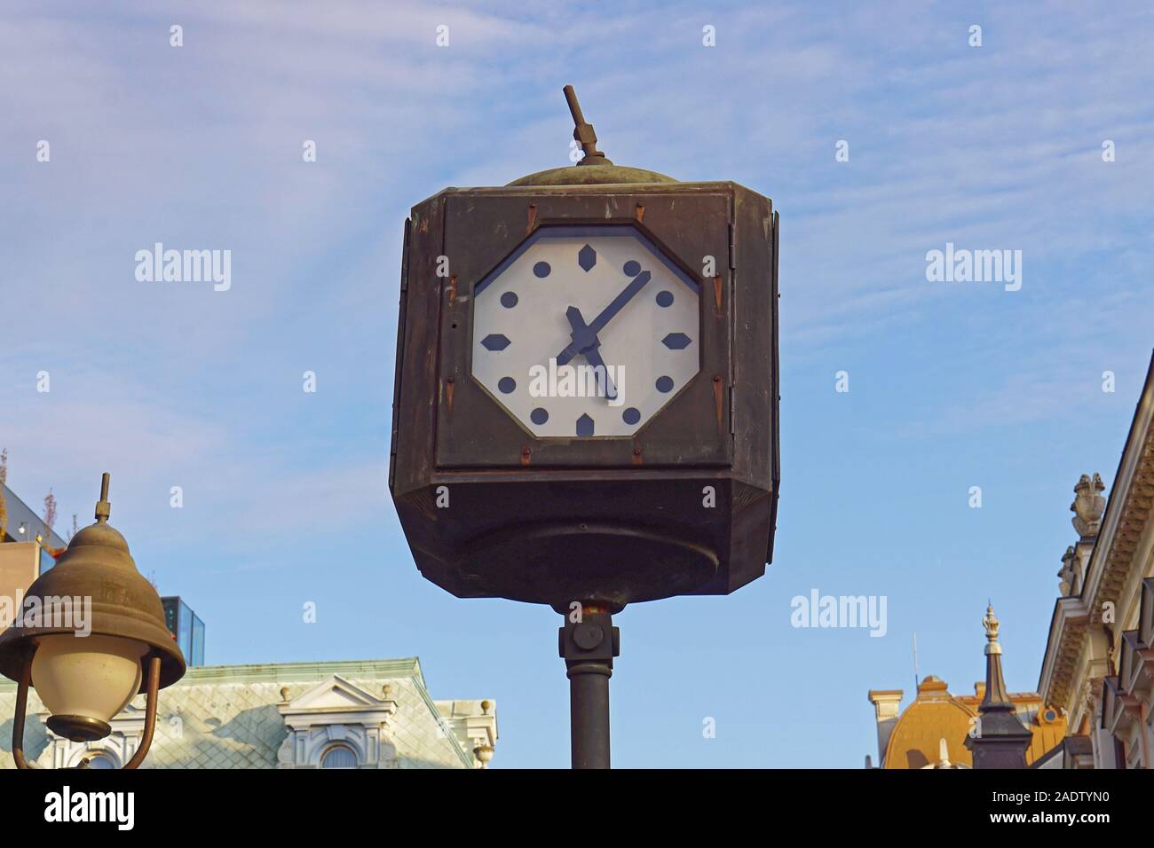 Public clock at pole in Belgrade Serbia Stock Photo - Alamy