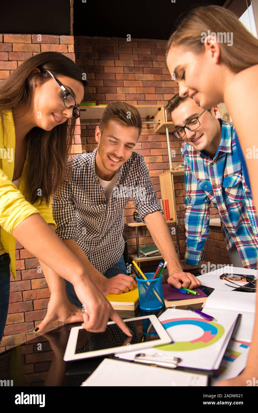 Active team working together on the task Stock Photo - Alamy