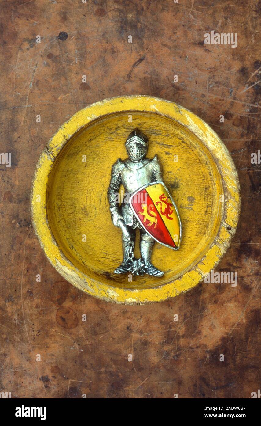 Lead model of heavily armoured medieval knight carrying chained spiky ...