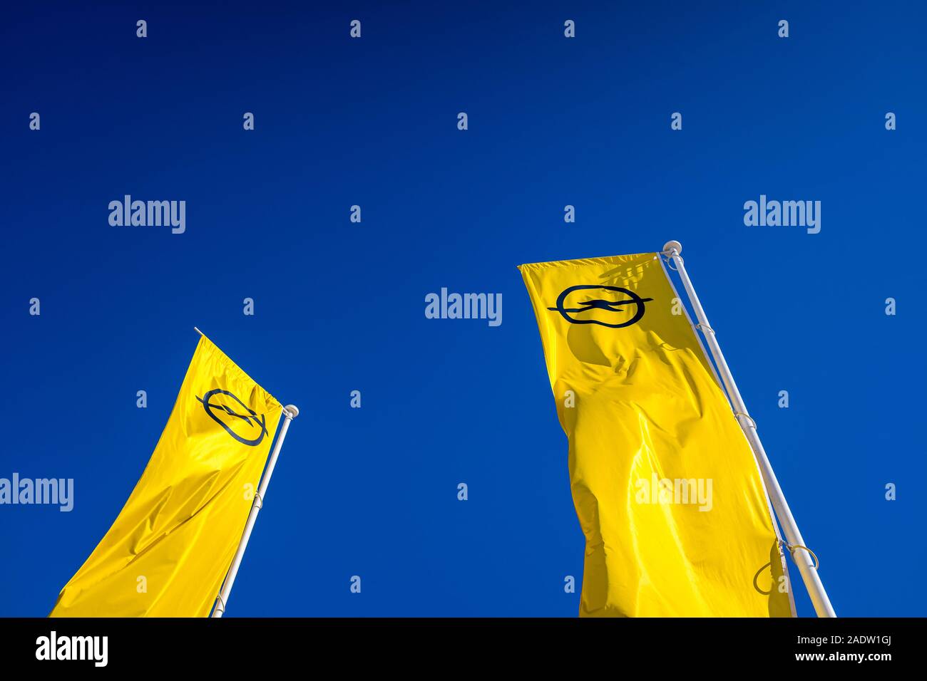 Valencia, Spain - December 3, 2019: Yellow flags with the logo of Opel ...