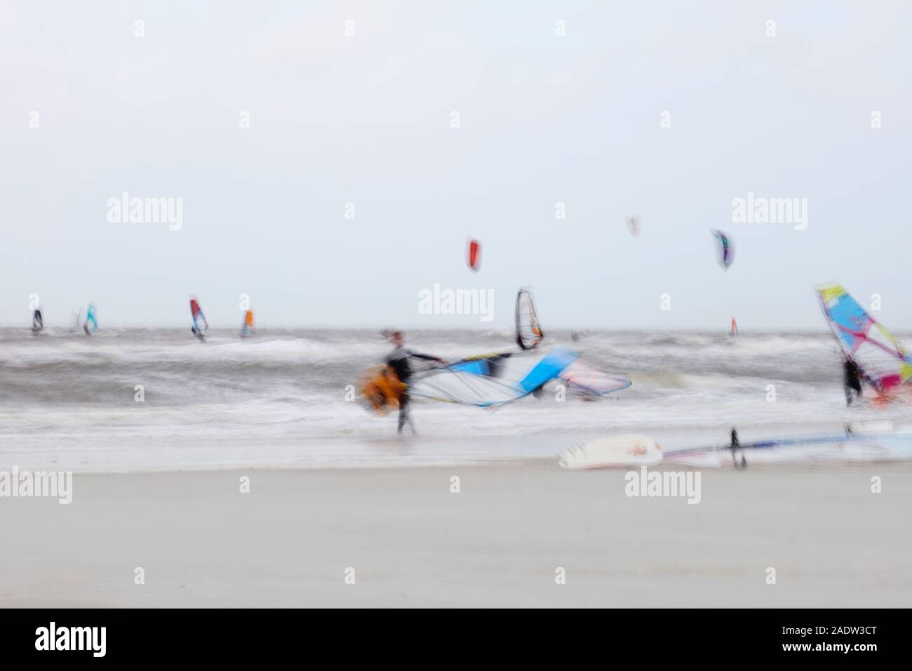 Wind surfer on beach hi-res stock photography and images - Alamy